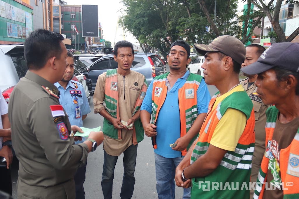 Tarif Parkir Turun, Satpol PP Pekanbaru Turut Sosialisasikan ke Jukir dan Masyarakat - Sumber ...